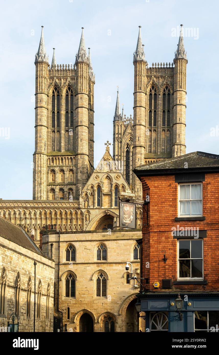 Towers of cathedral church rise above the medieval Exchequer Gate ...
