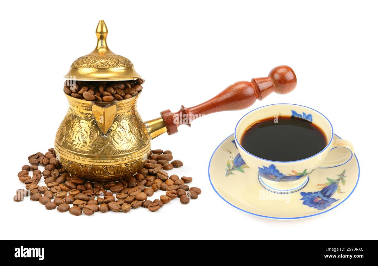 Coffee in vintage porcelain cup and pot of coffee and coffee beans ...