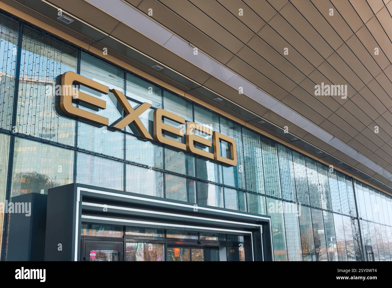 Almaty, Kazakhstan - February 21, 2025: Exeed logo above the entrance ...