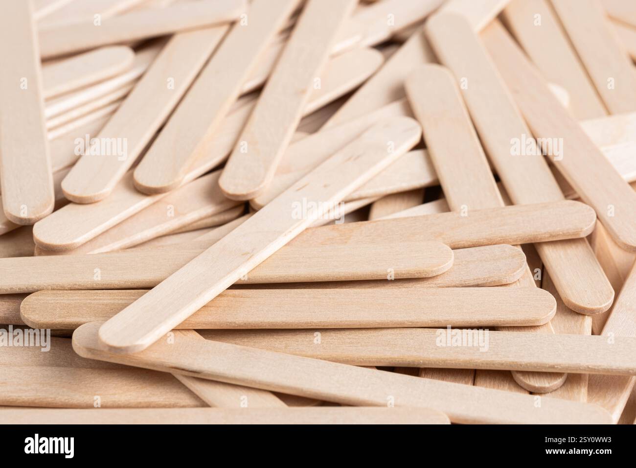Wooden popsicle sticks background, closeup Stock Photo - Alamy