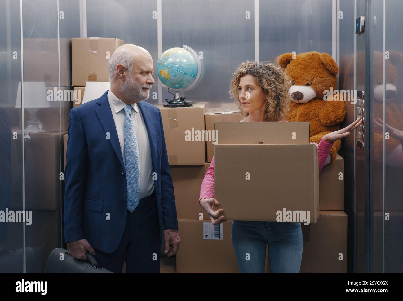 Woman moving into her new apartment, she filled the elevator with ...