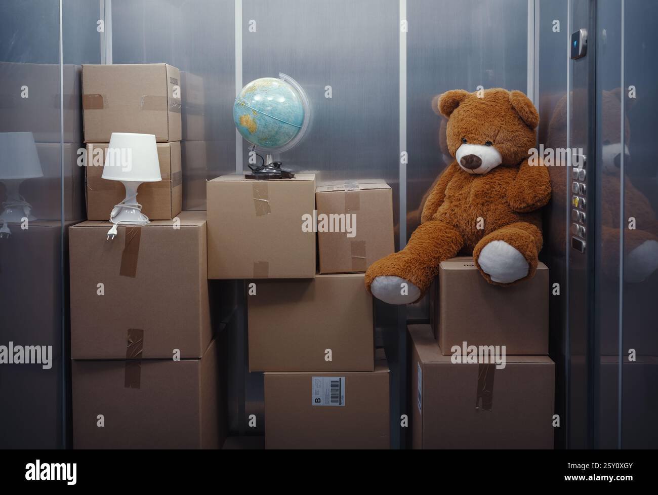 Elevator full of cardboard boxes and personal belongings, relocation ...
