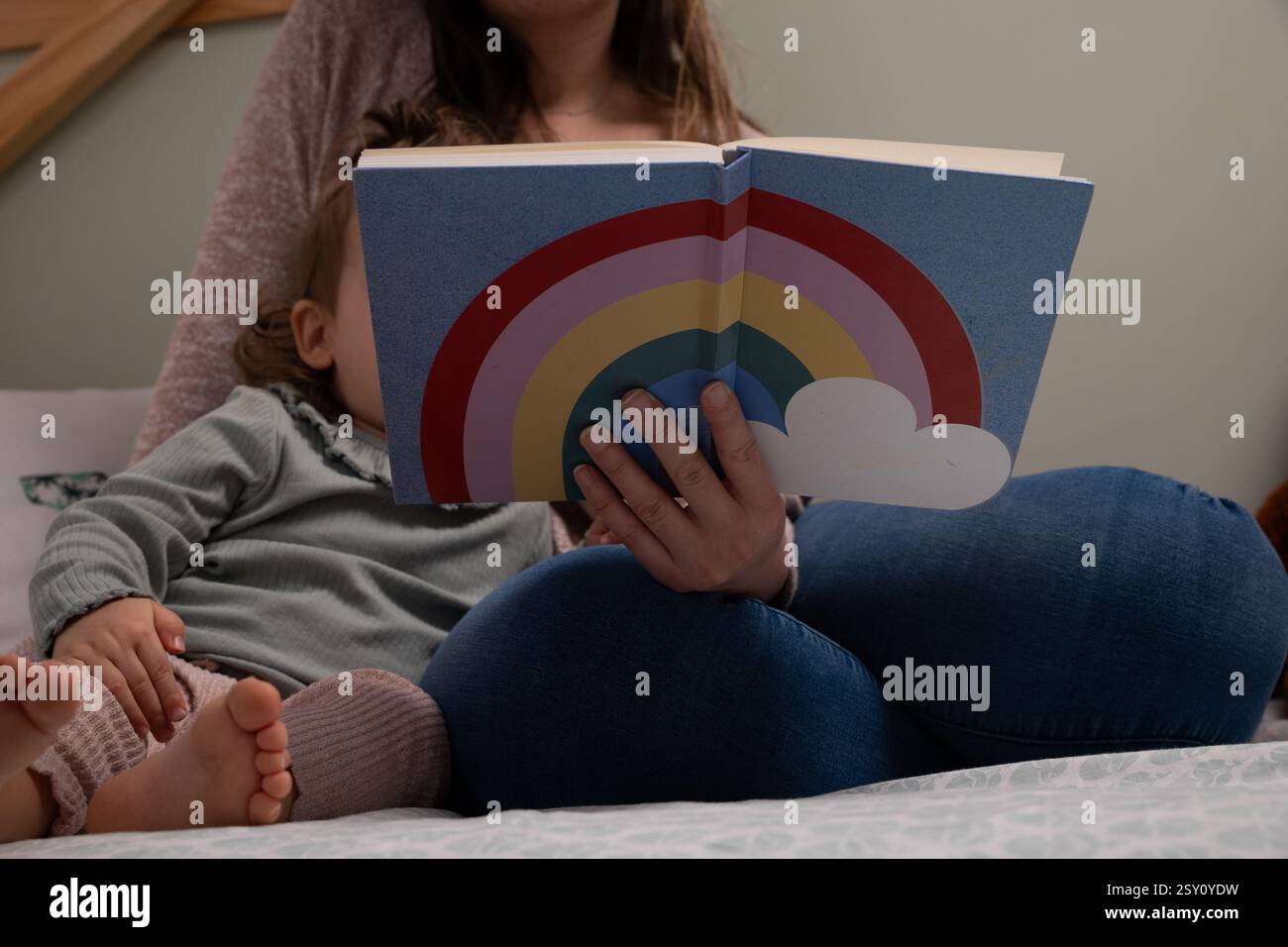 A Special Storytime Moment Between Mom and Daughter Stock Photo - Alamy