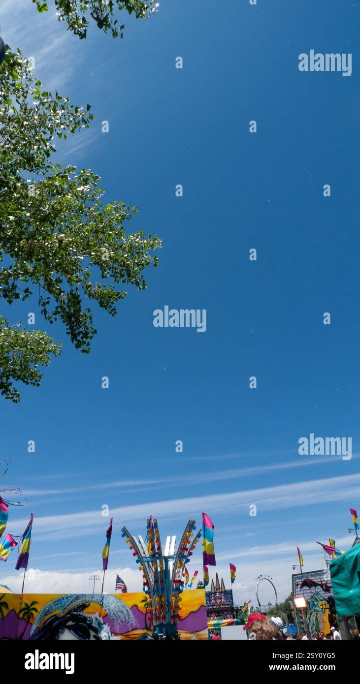 Local carnival signs and rides Stock Photo - Alamy