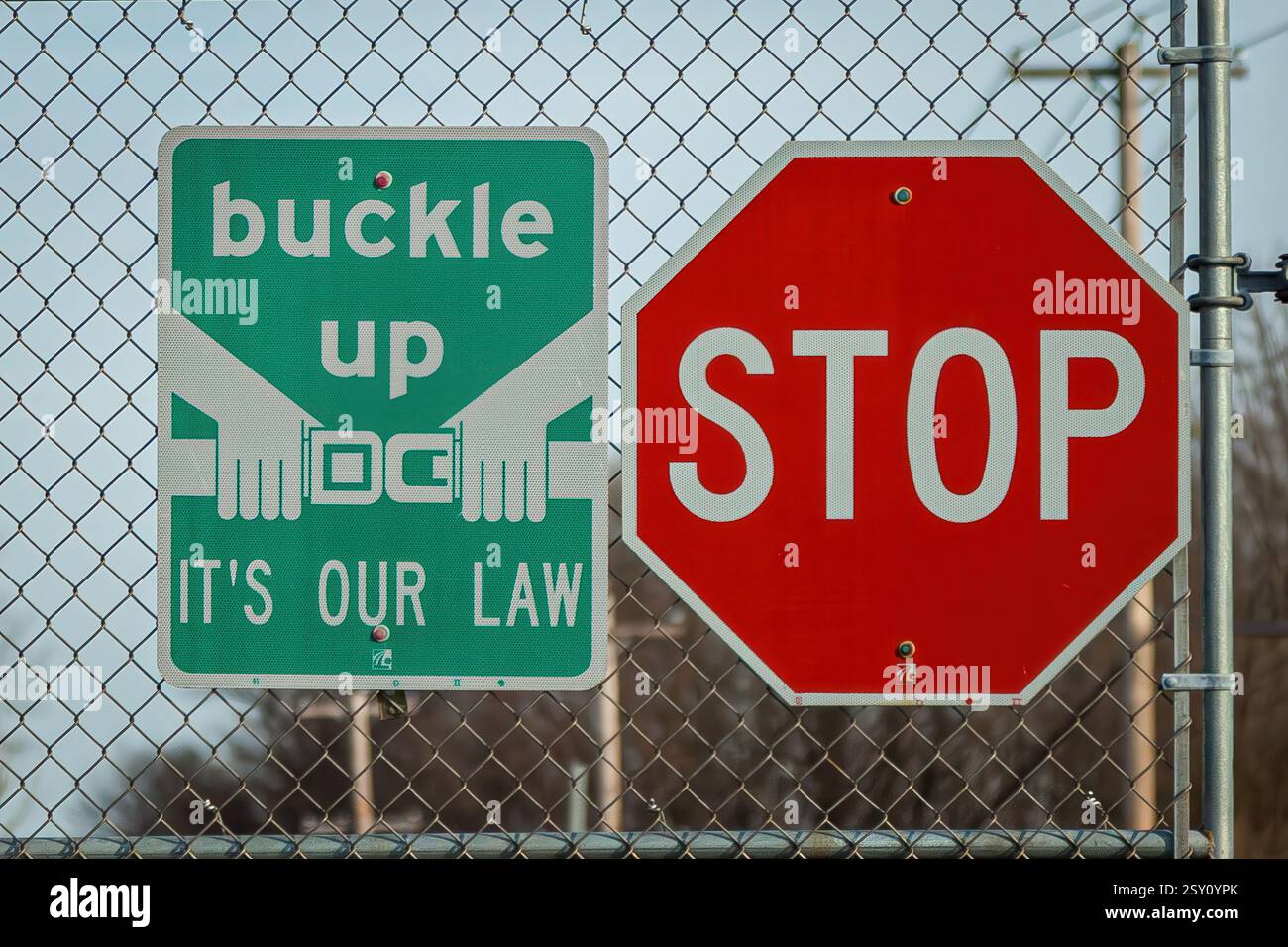 Stop and Buckle Up road signs Stock Photo - Alamy