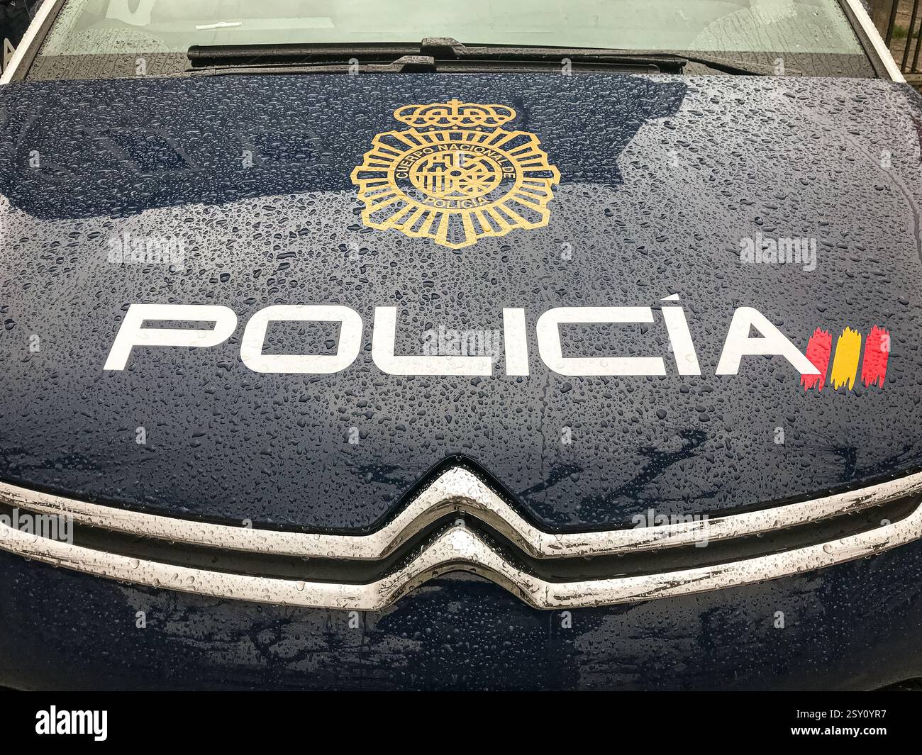 Policia sign on spanish police car Stock Photo - Alamy