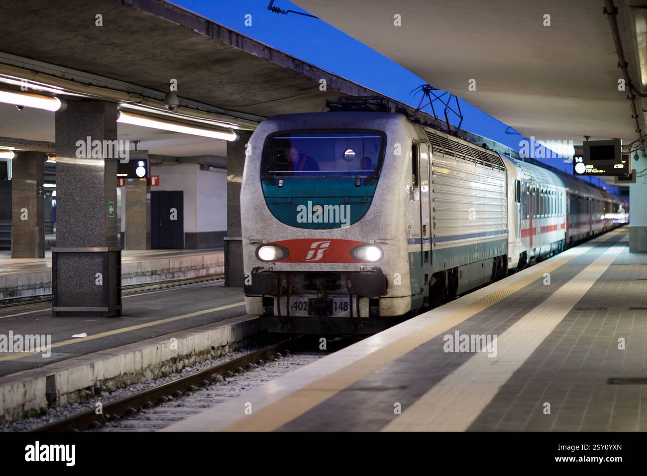 Intercity train arrives at the station. Naples, Italy - April 22, 2018 ...