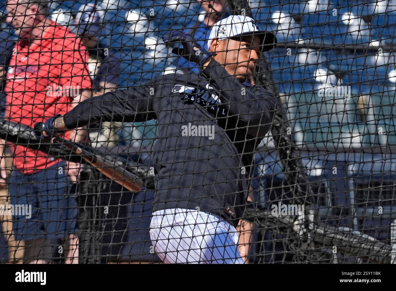 New York Yankees' Dominic Smith takes batting practice before a spring training baseball game ...