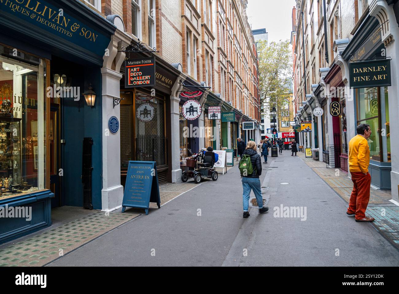 Cecil Court, art and antiques shops in London Stock Photo - Alamy