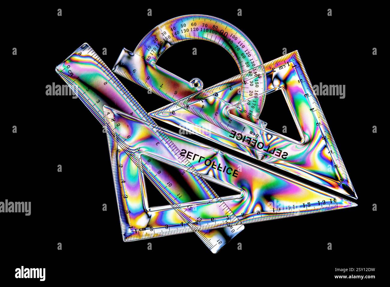 Cross polarisation of plastic stress patterns Stock Photo - Alamy