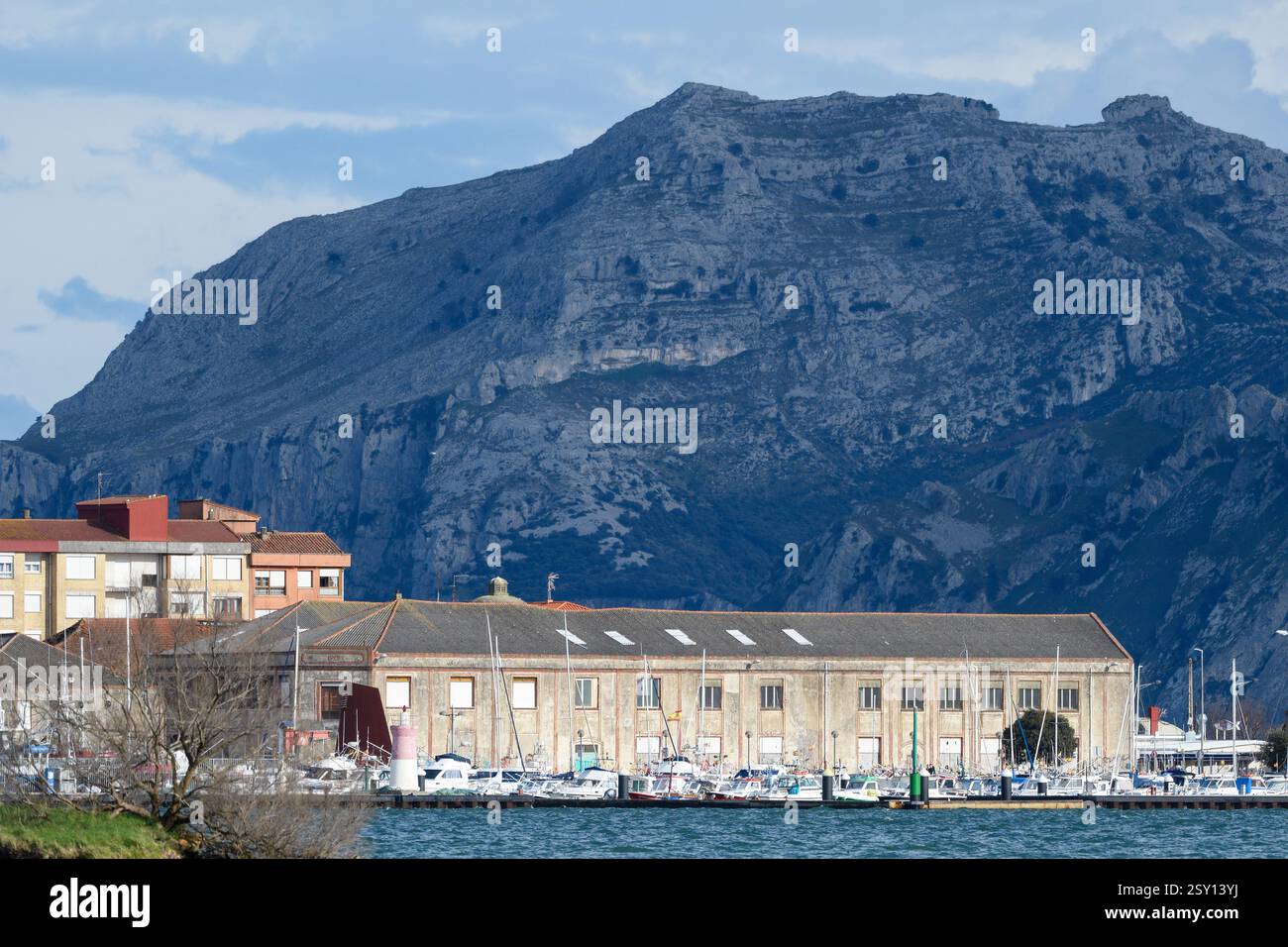 Port of Santoña with Monte Candina in the background Stock Photo - Alamy