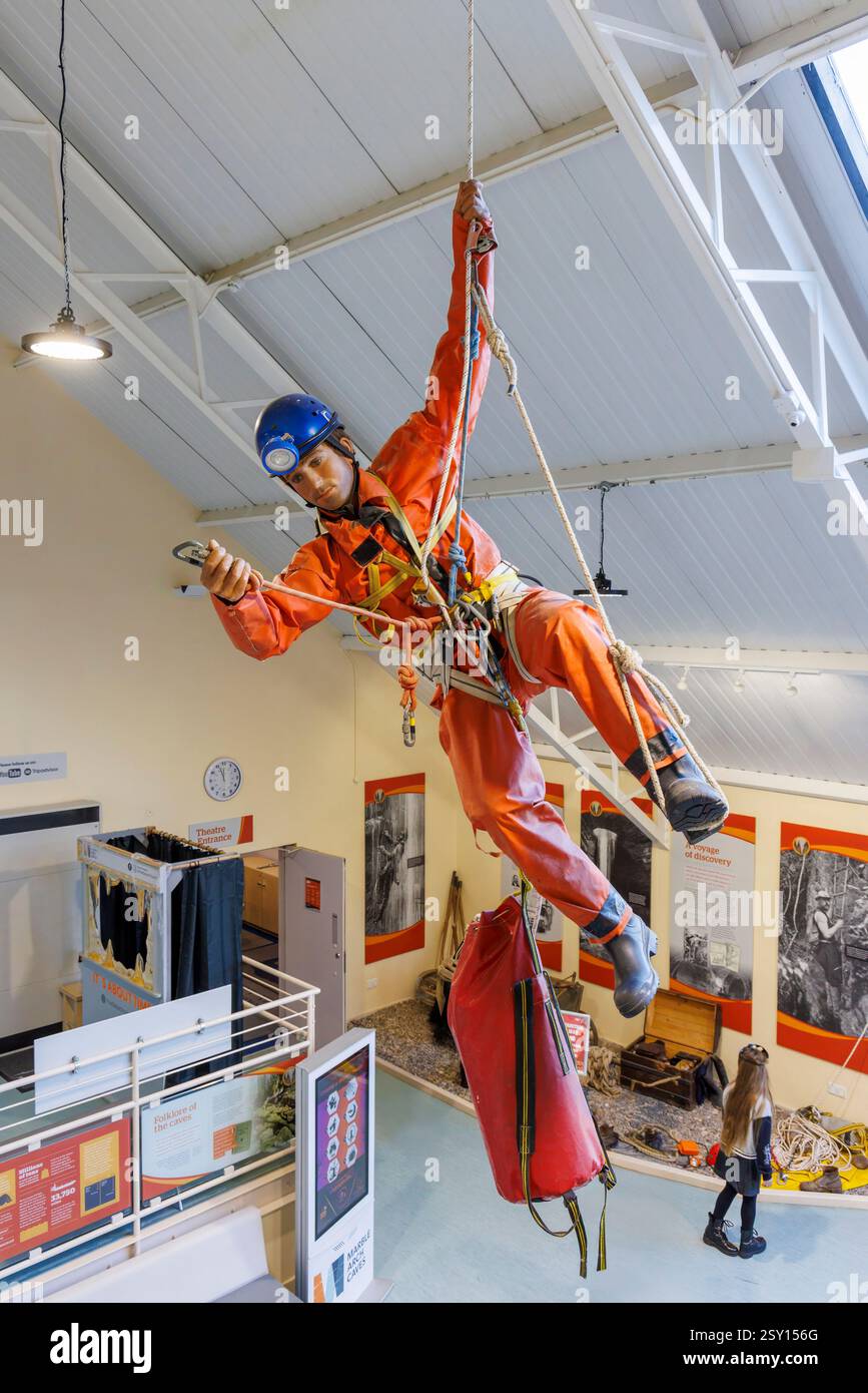 Model exhibit of caver climbing a rope using single rope techniques ...