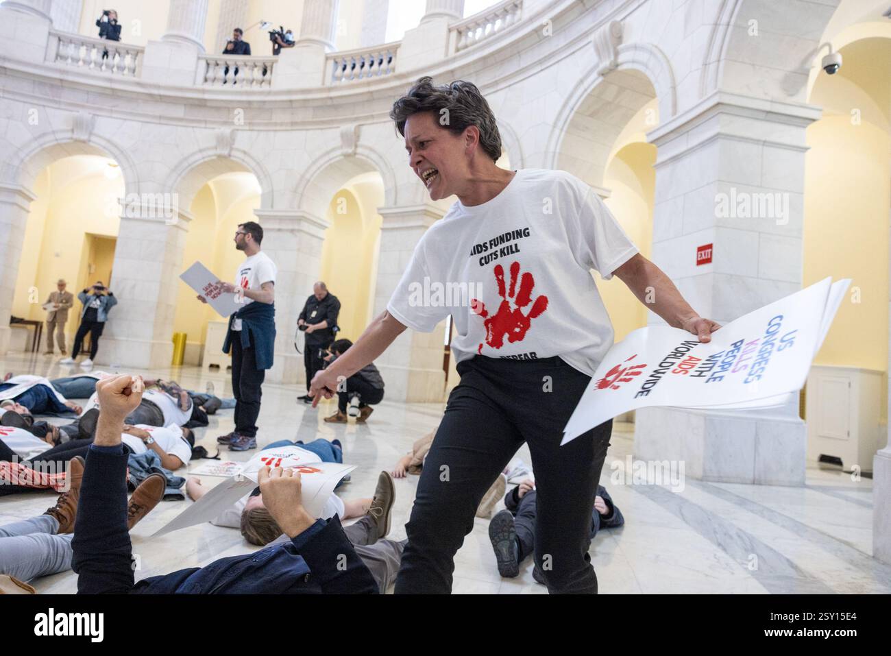 Demonstrators protest the dismantling of USAID at the Cannon House ...