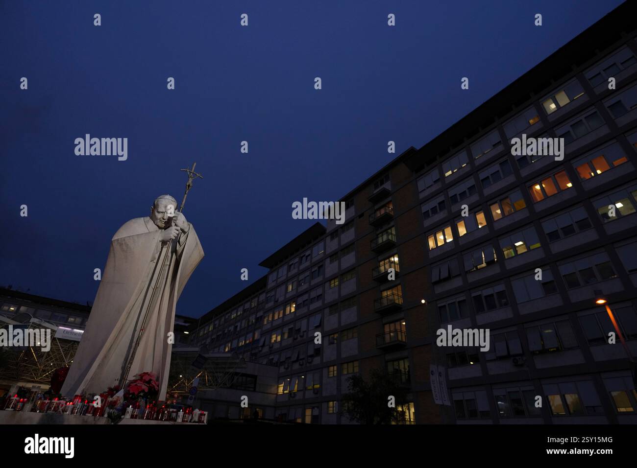 Candles are lit up for Pope Francis in front of the Agostino Gemelli ...