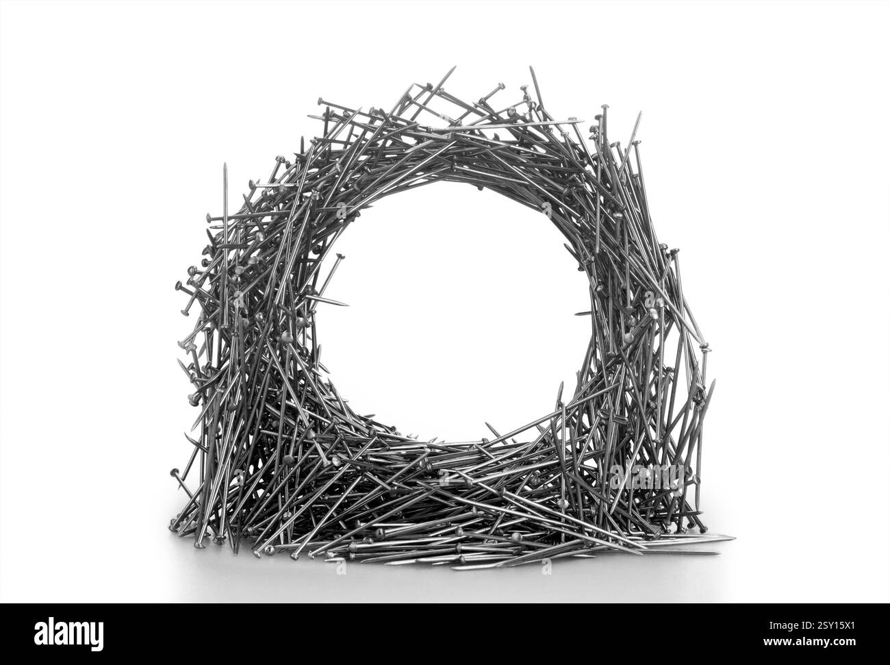 Balancing of pin, hole shape, india, asia Stock Photo - Alamy