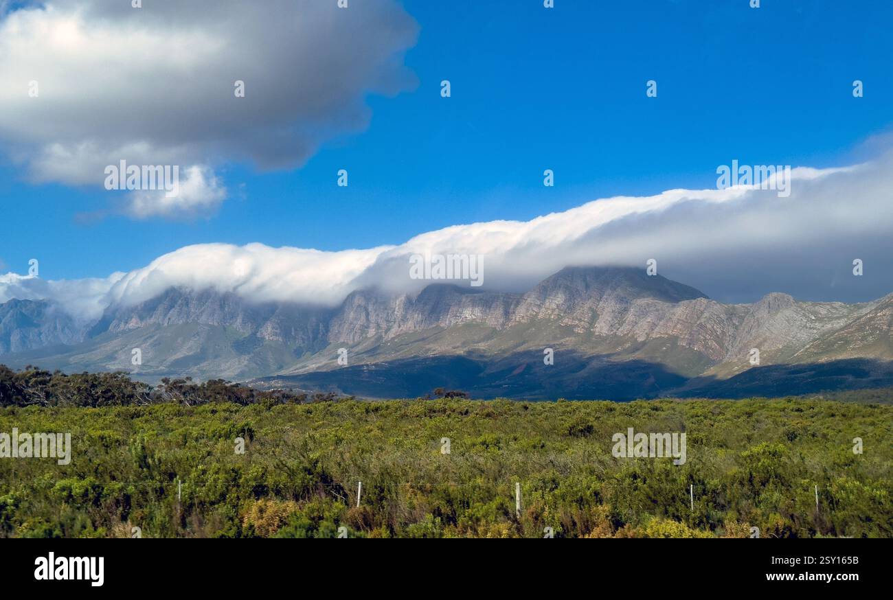 Mountain landscape with a dramatic cloud over the peaks. Tablecloth ...