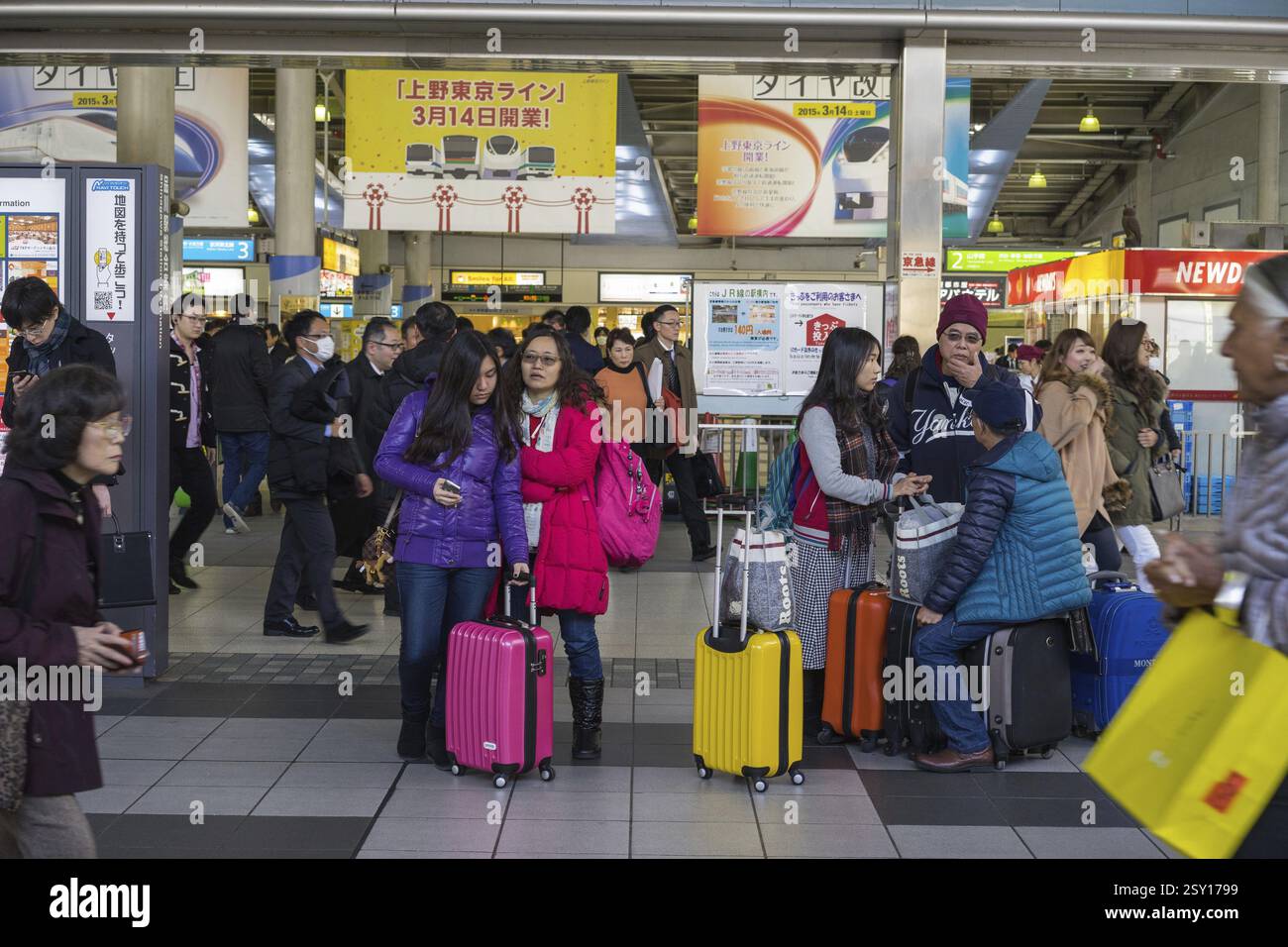 Passenger with luggage, tokyo, japan Stock Photo - Alamy