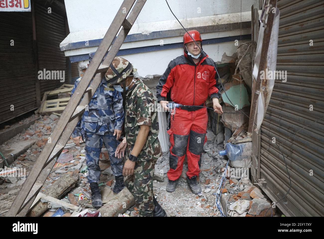 Rescue personnel searching dead bodies, earthquake, nepal, asia Stock ...