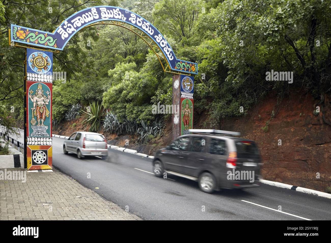 Car running on road venkateswara balaji temple, tirupati, andhra ...