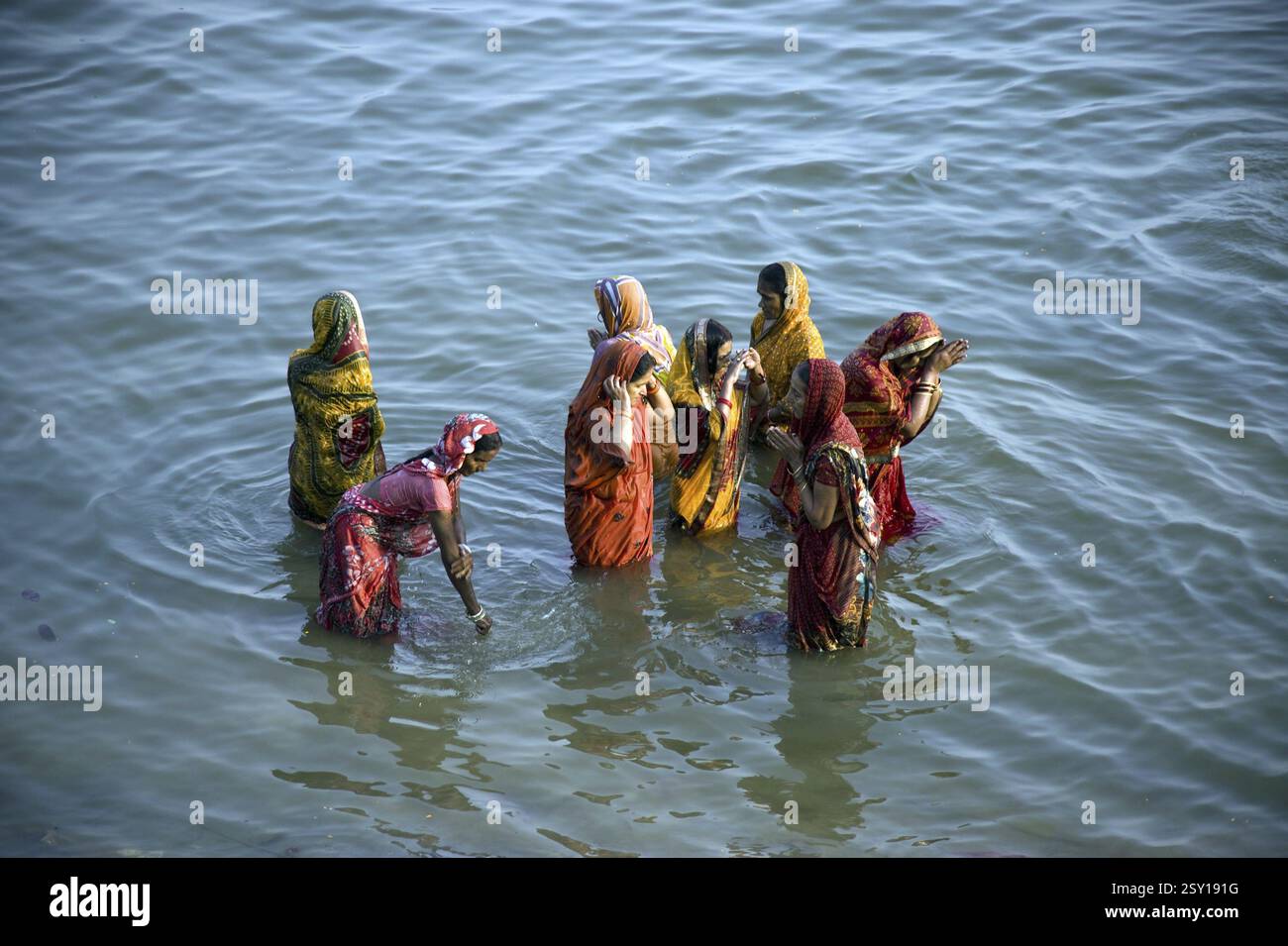Indian woman bathing in river hi-res stock photography and images - Alamy