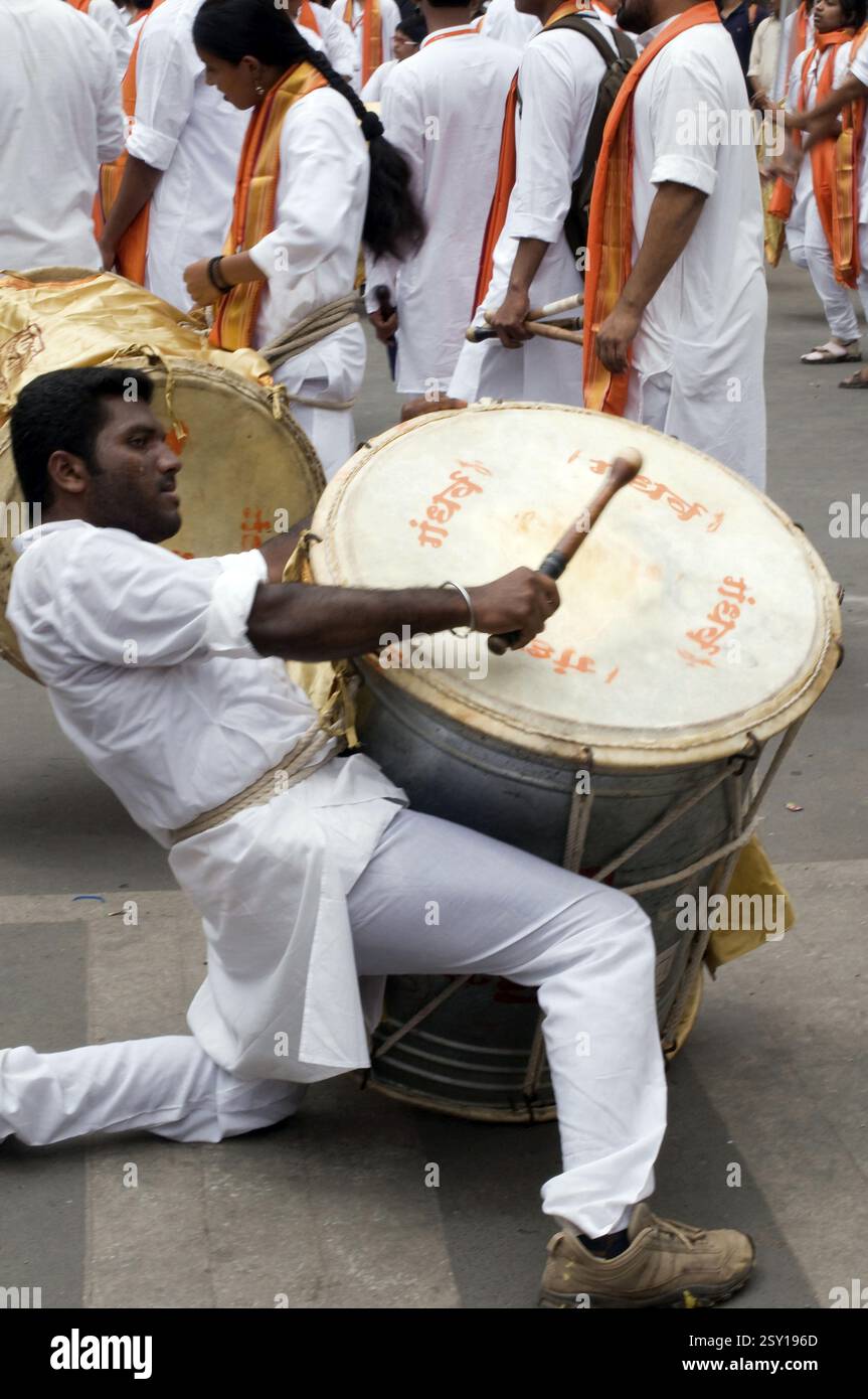 Man playing musical instrument Dhol in Ganesh festival in pune at ...
