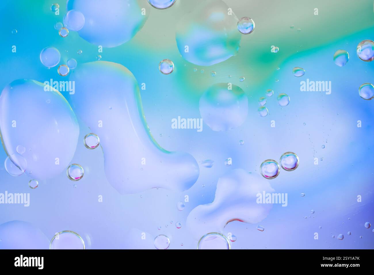 Colorful abstract background with oil bubbles floating in water ...