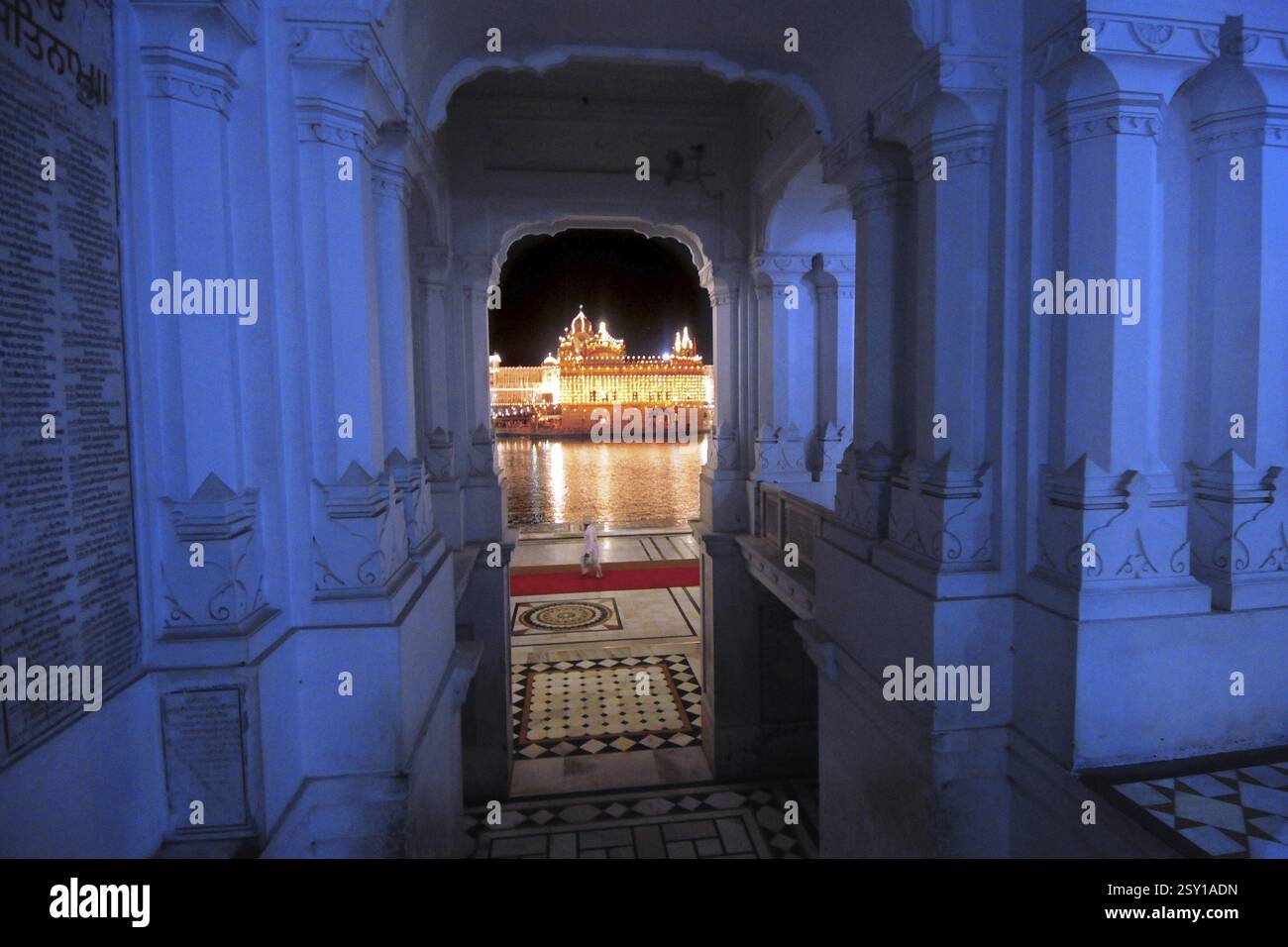 View of golden temple through arch, amritsar, punjab, india, asia Stock ...
