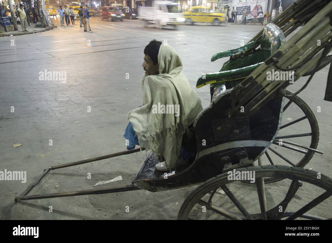 Hand rickshaw puller waiting for passenger at West Bengal India Stock ...