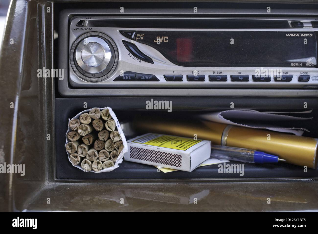 Concept, bidi match box in car, india, asia Stock Photo - Alamy