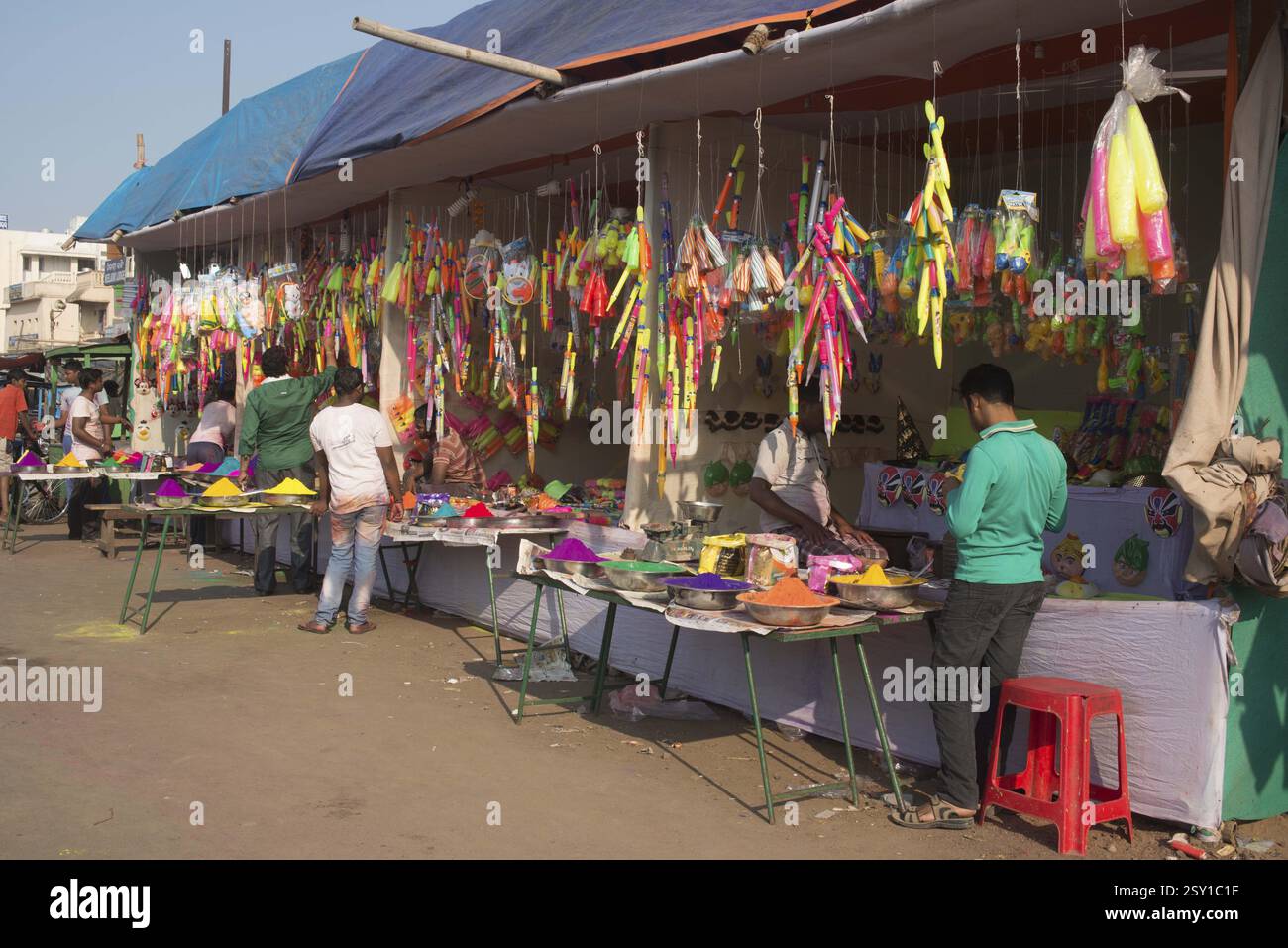 Dry colours and pichkari stall, holi festival, puri, orissa, india ...