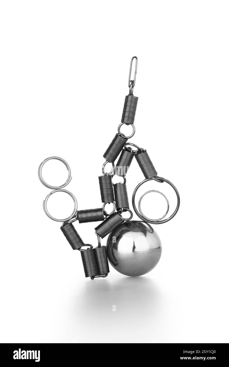 Balancing of ball ring and spring, india, asia Stock Photo - Alamy