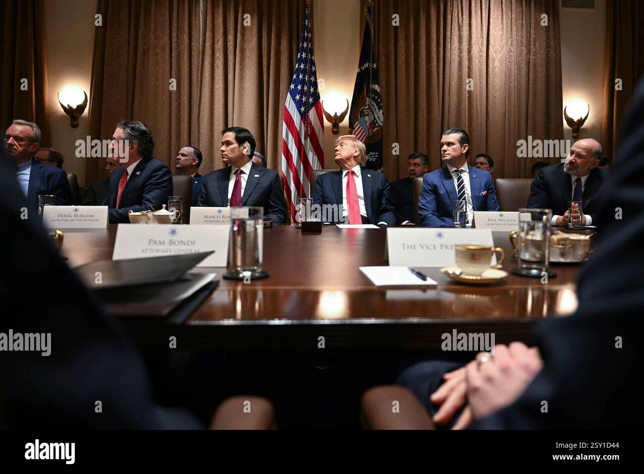 President Donald Trump holds his first Cabinet meeting at the White ...