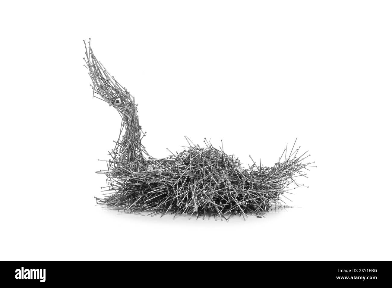 Balancing of pin, swan shape, india, asia Stock Photo - Alamy