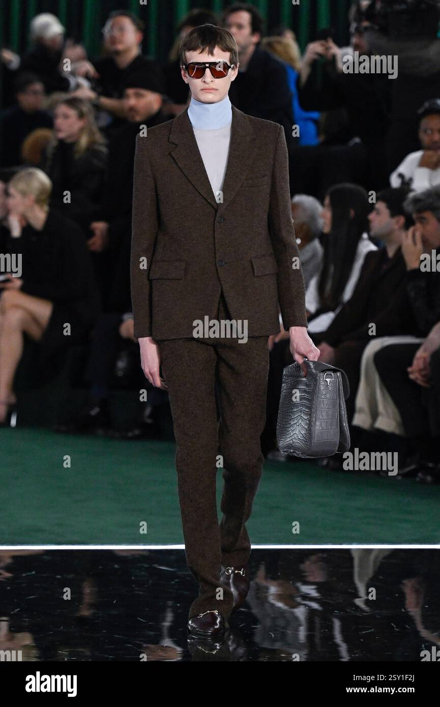 A model walks on the runway during the Gucci Ready to Wear Fashion Show ...