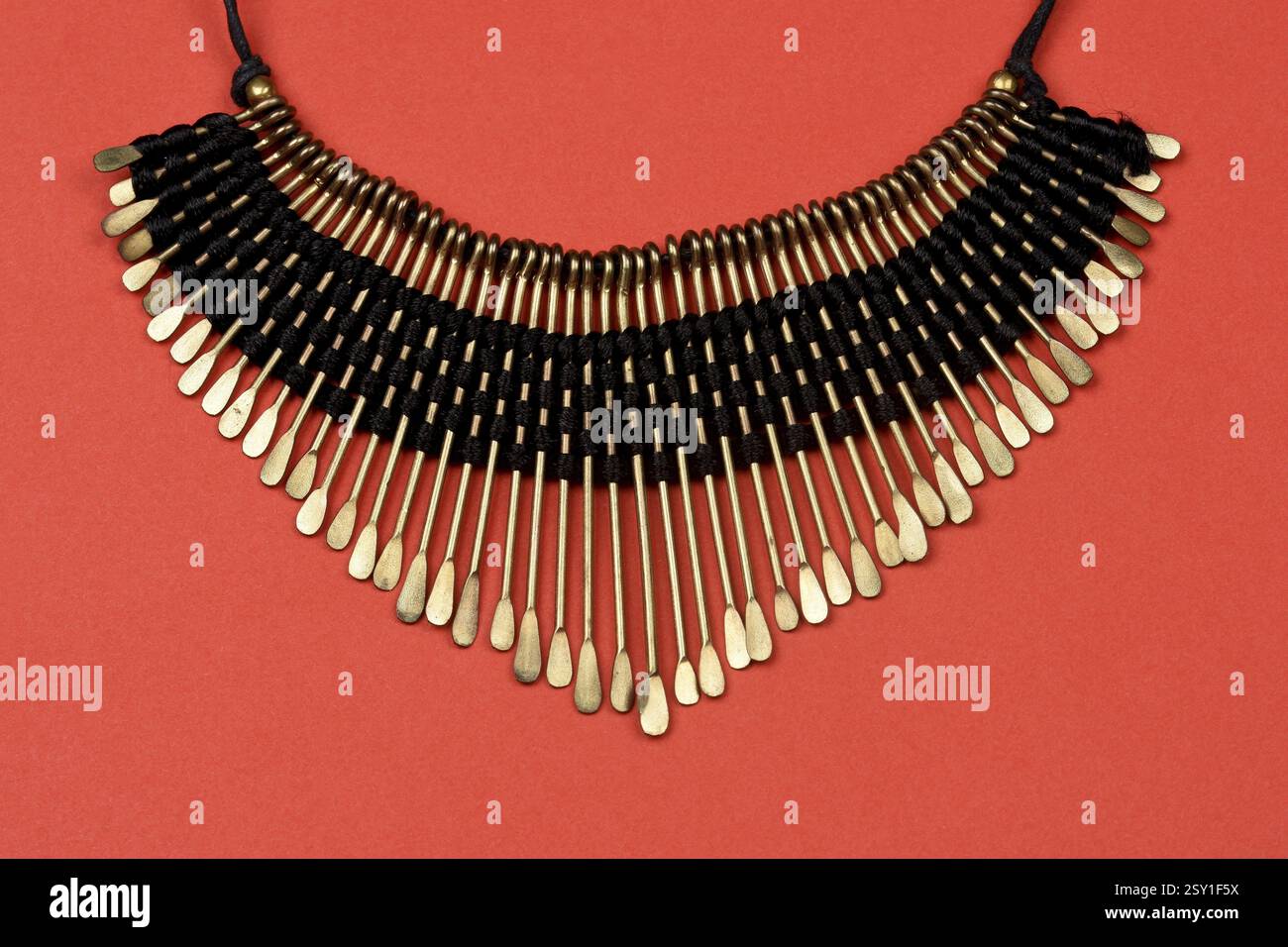 Bohemian style jewelry set on vintage red background. Top view point ...