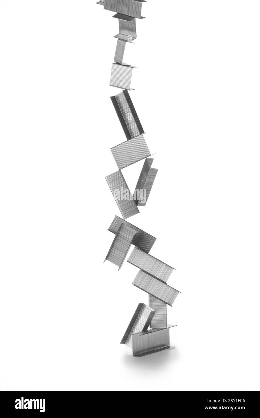 Balancing of stapler pin, india, asia Stock Photo - Alamy