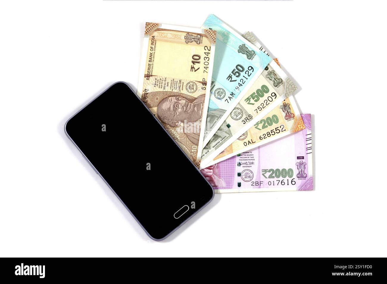 Mobile smart phone and indian rupee notes, digital money, fin-tech ...