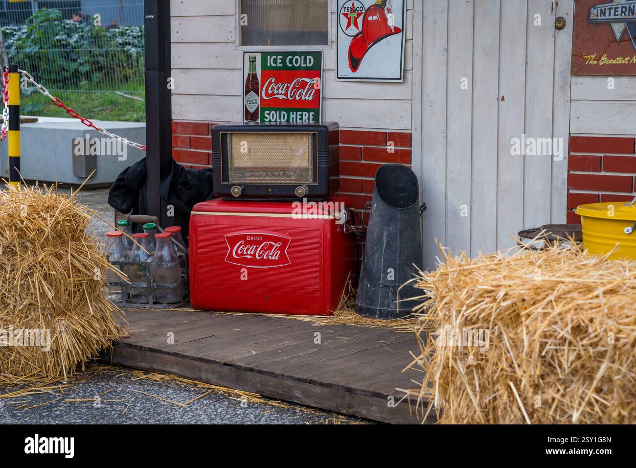 Rustic charm with vintage ice chest and retro radio on a cozy farm ...