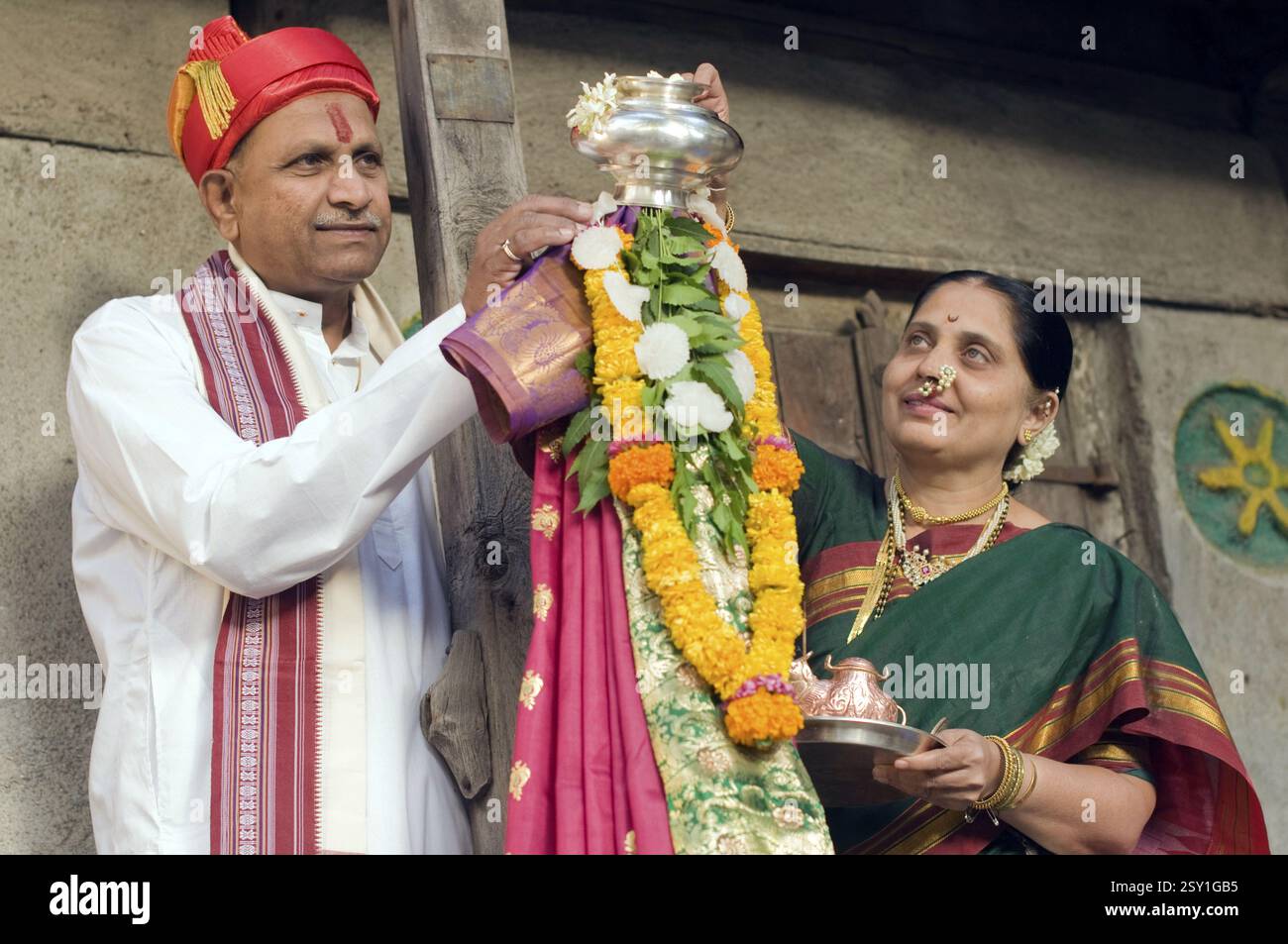 Maharashtrian couple performing the festival of Gudi Padva Pune India ...