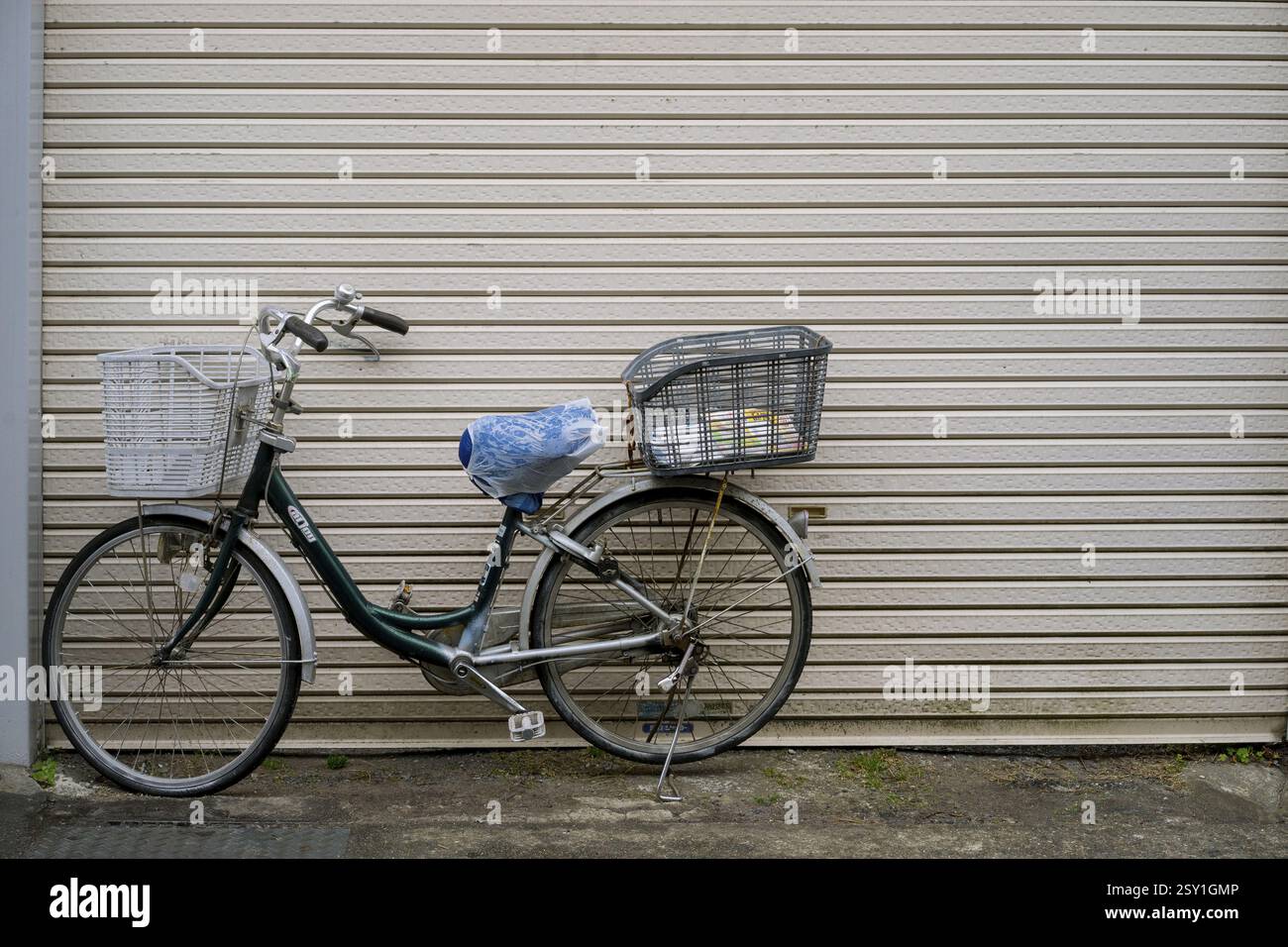 Ladies bicycle with basket carriers, kamakura, japan Stock Photo - Alamy
