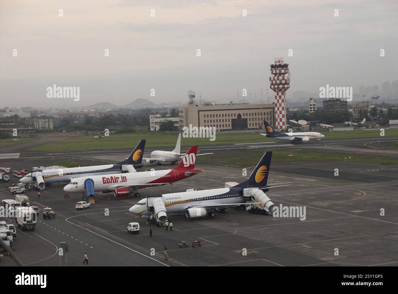Plane taxing at mumbai airport Stock Photo - Alamy
