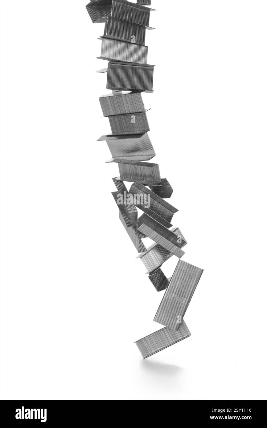 Balancing of stapler pin, india, asia Stock Photo - Alamy