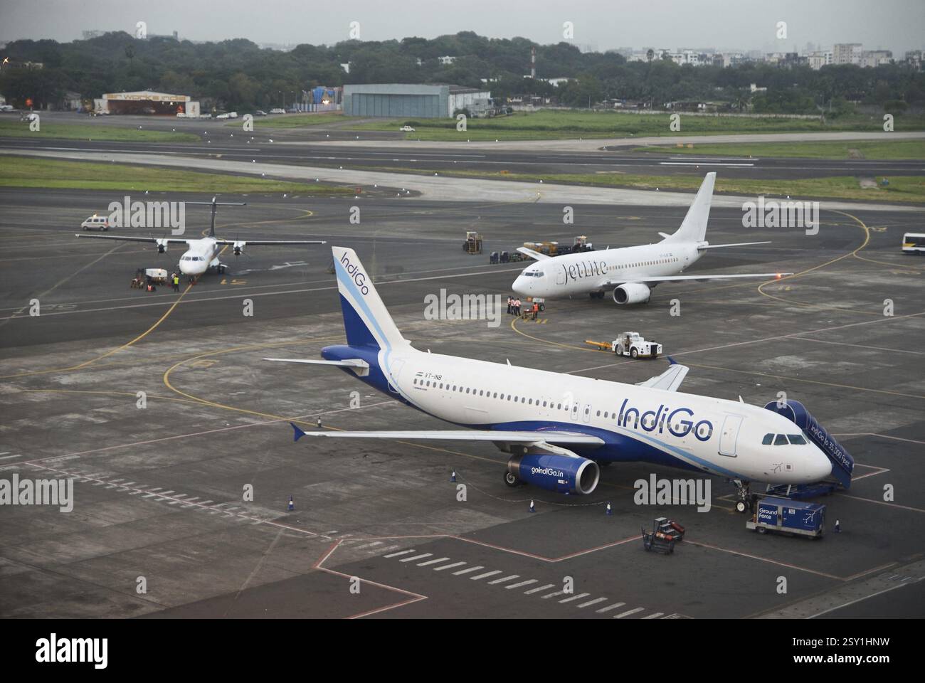 Plane taxing at mumbai airport Stock Photo - Alamy
