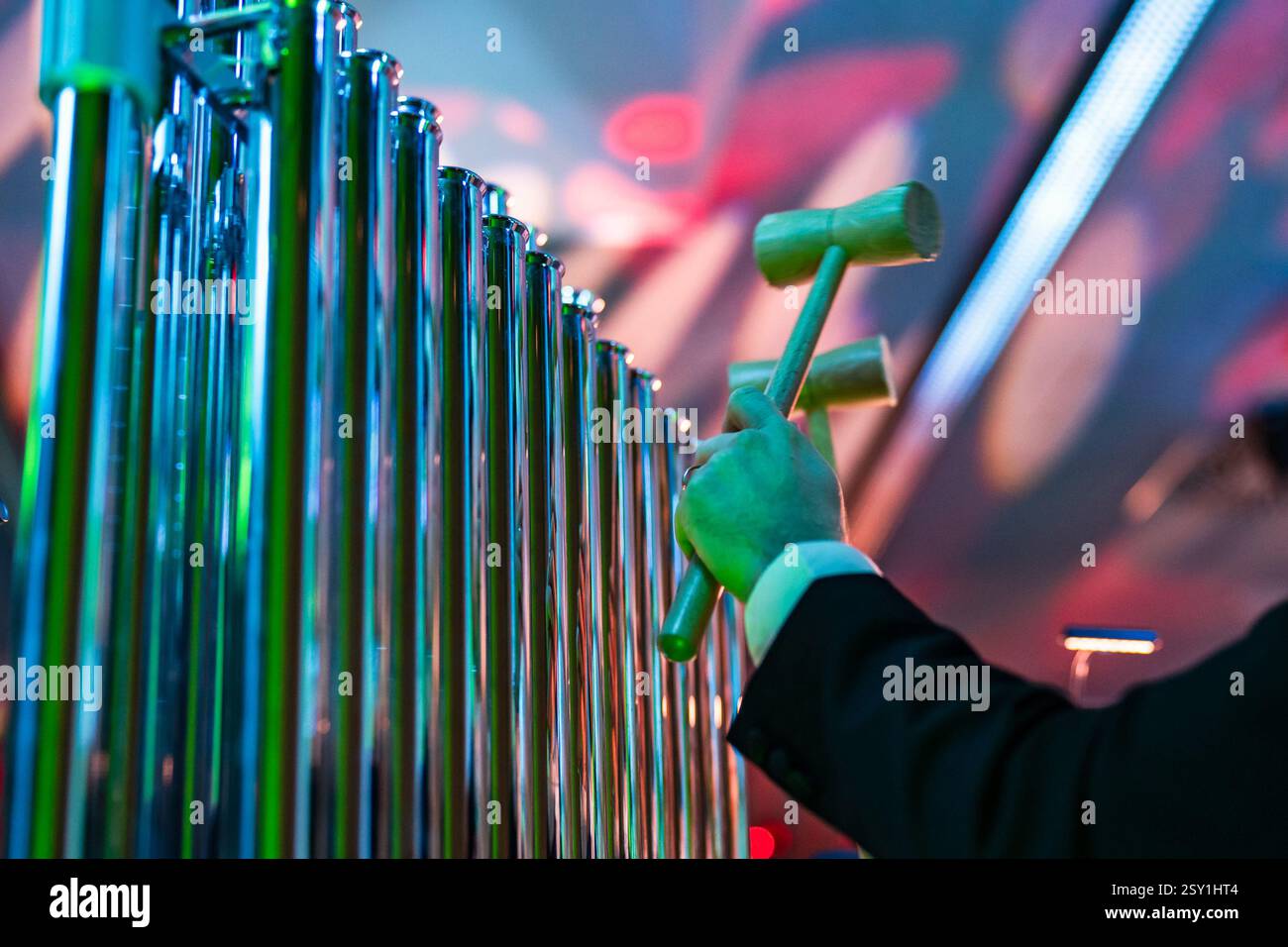 musical instrument - tubular bells struck with a hammers during a ...