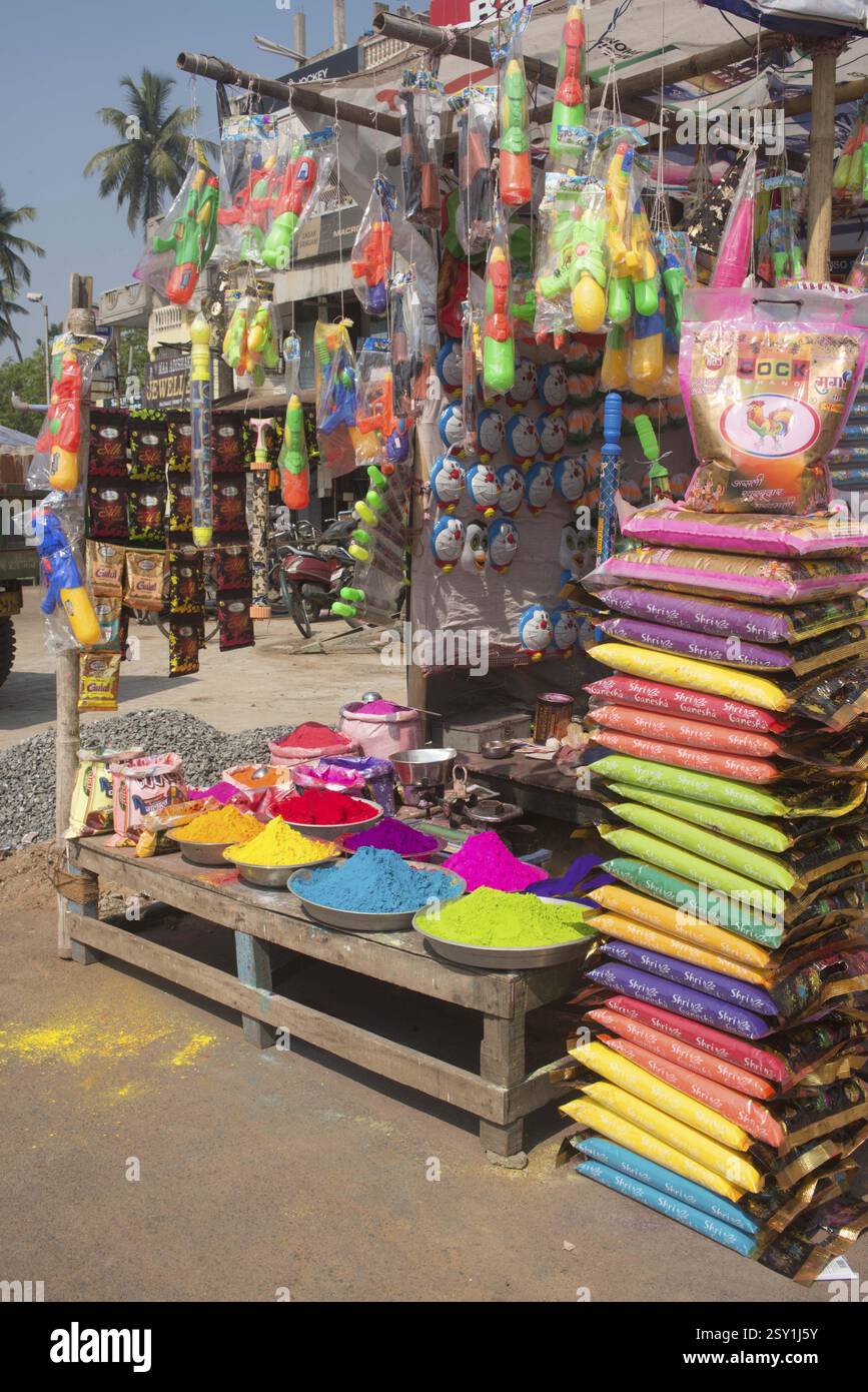 Dry colours and pichkari stall, holi festival, puri, orissa, india ...