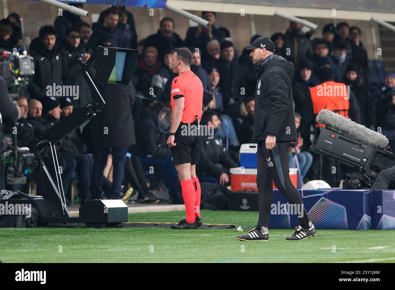 The Referee of the match, Felix Zwayer from Germany check the VAR ...