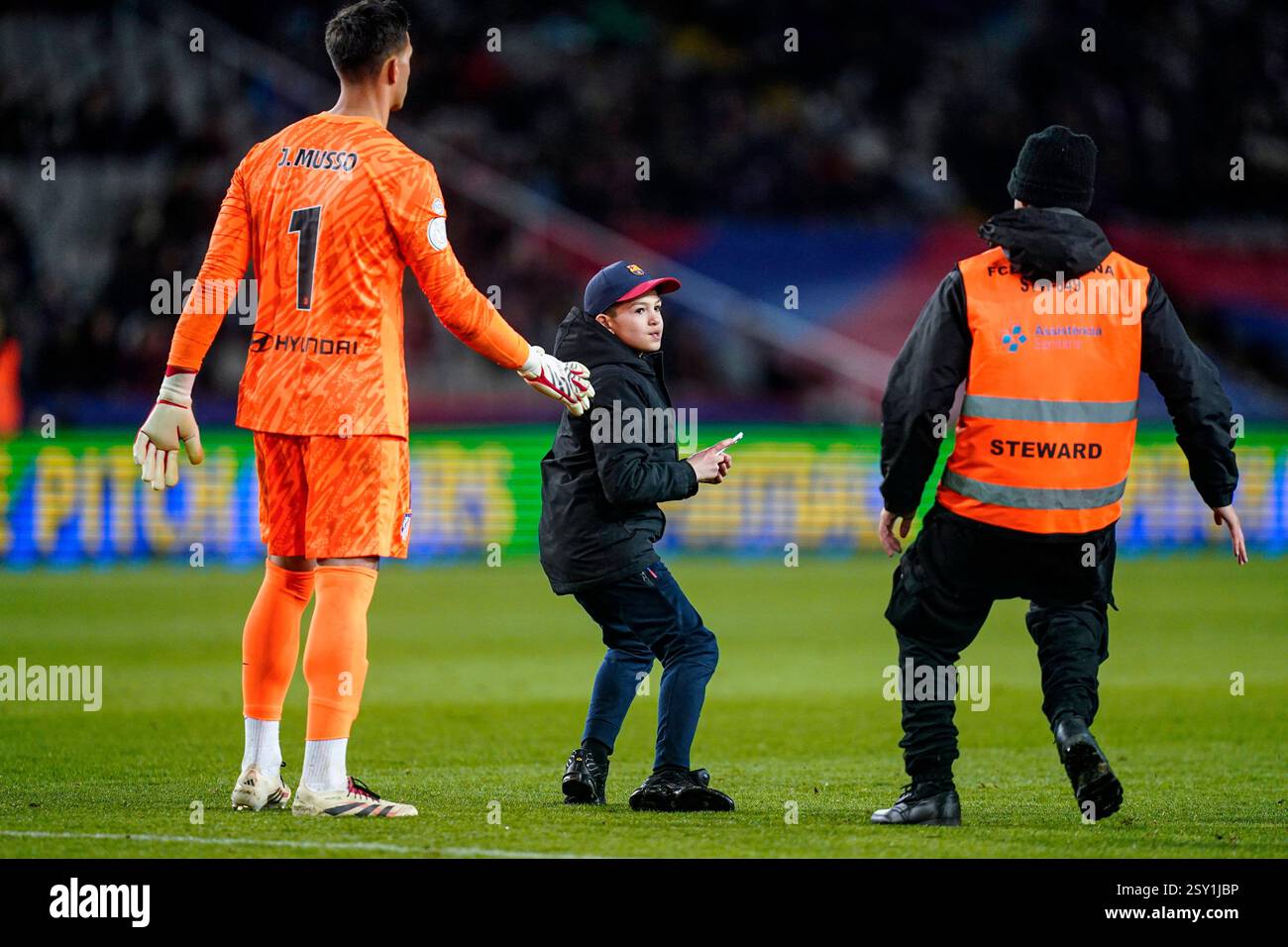 Child fan jumps onto the field during the Copa del Rey match, Semi ...