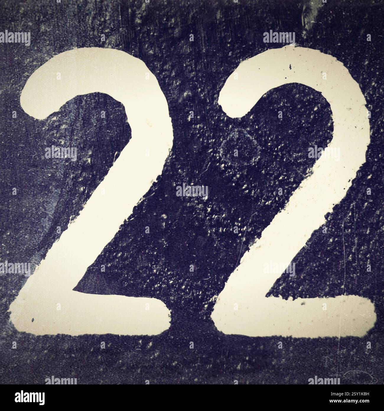 Number 22, White number on a dark background. Black and white old photo ...