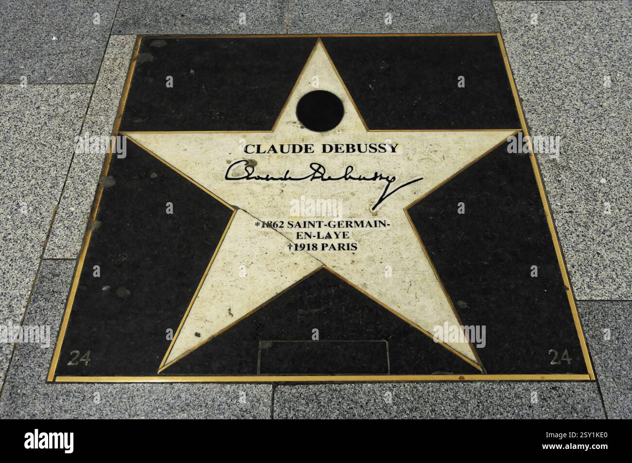 Commemorative plaque for Claude Debussy on a pavement with a star ...