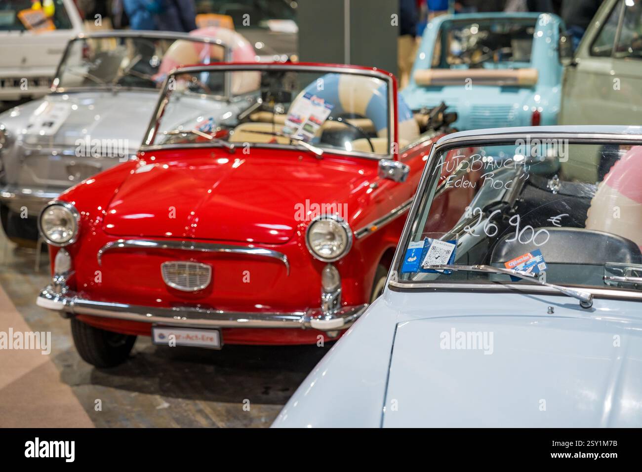 Classic cars on display at a vibrant vintage auto show in the city ...